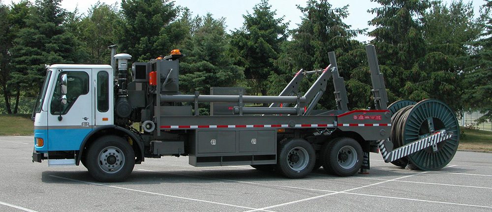 Dejana Tandem Reel Loader - Dejana Truck & Utility Equipment
