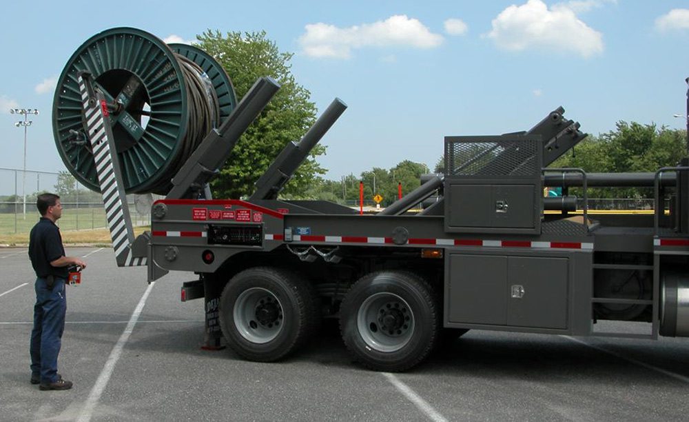 Dejana Tandem Reel Loader - Dejana Truck & Utility Equipment